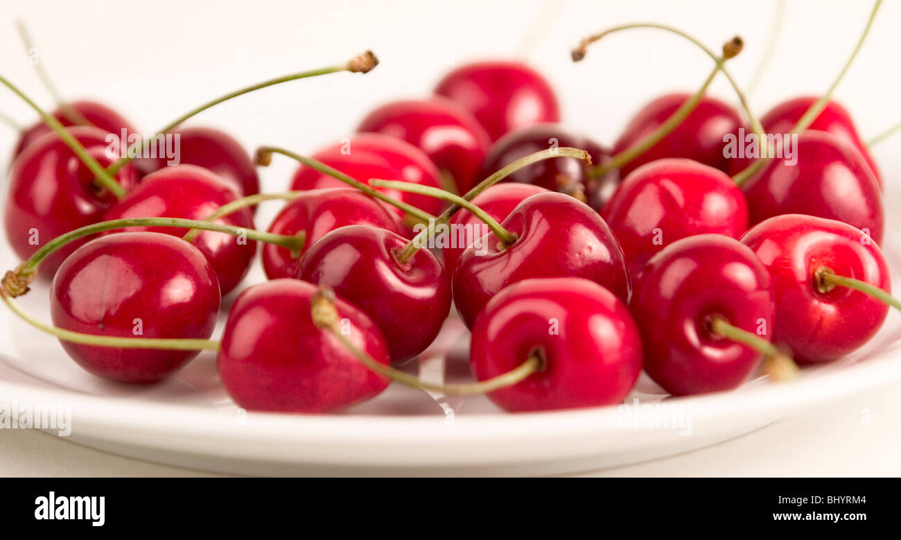 cherries on a plate Stock Photo - Alamy