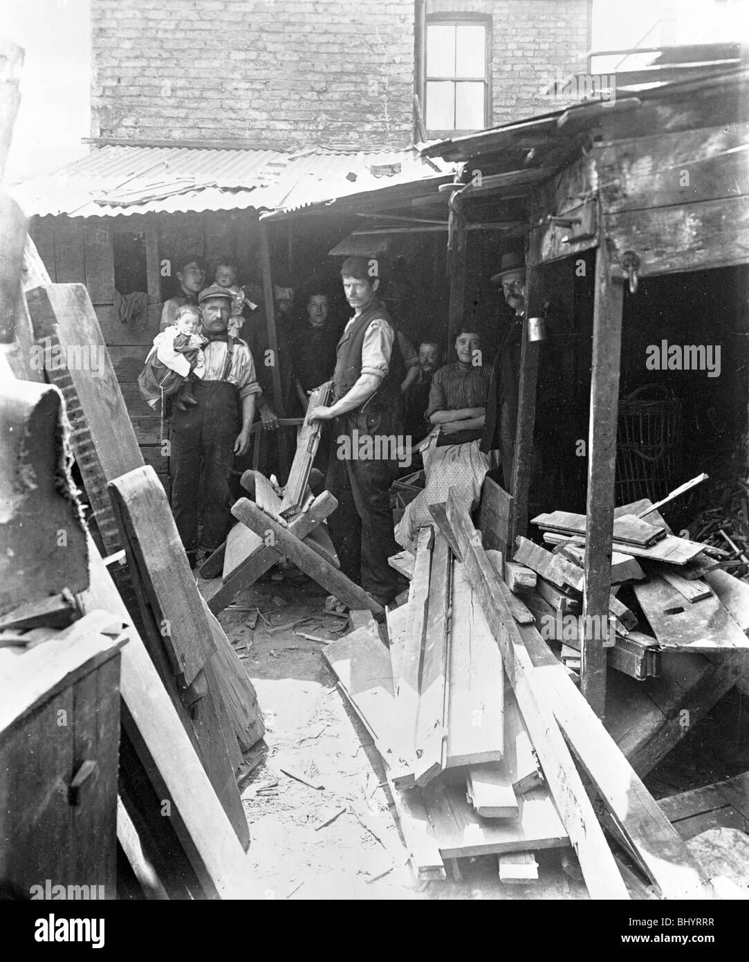 Making firewood from scrap timber, 1900s. Creator: John Galt Stock ...