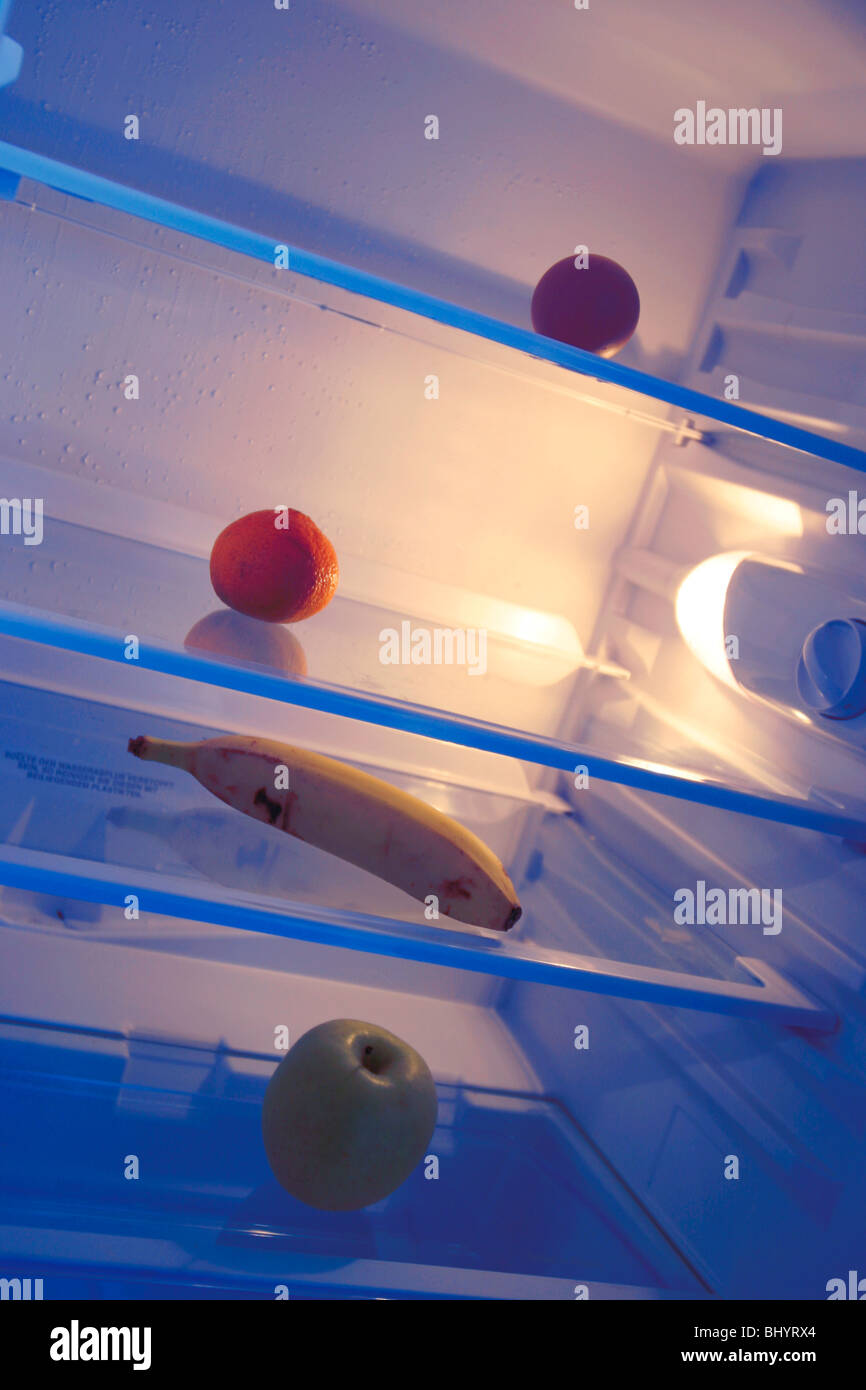 Apple in a refrigerator Stock Photo - Alamy