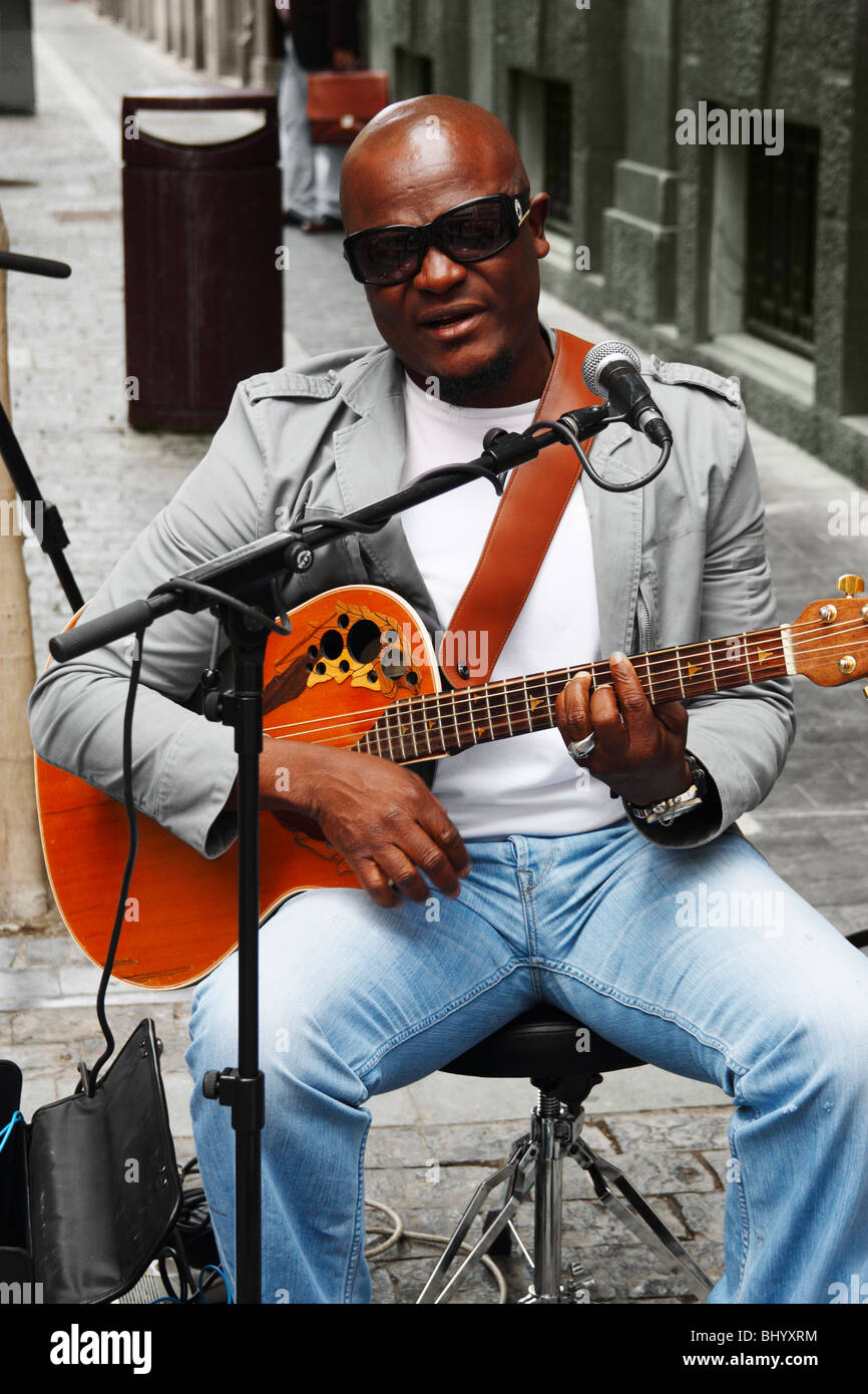 Musician Aaron Lordson posing for photographs with fans and signing ...