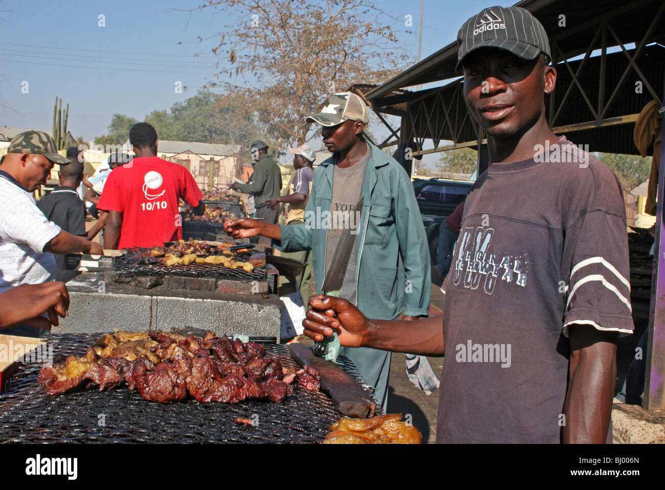 Man Barbequeing Meat In Katutura Central Township, Windhoek, Namibia ...