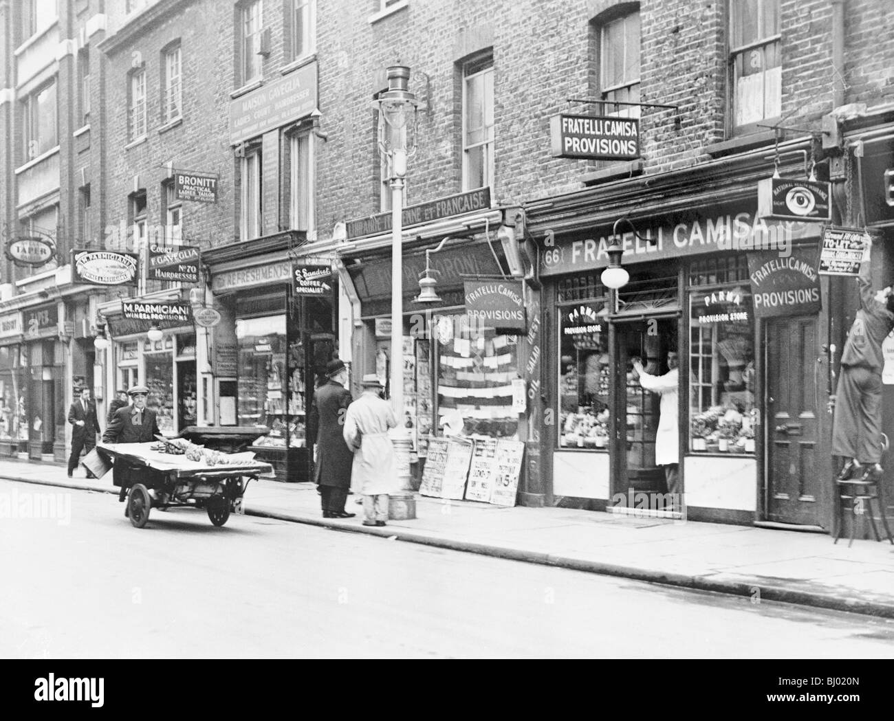 Old Compton Street, Soho, London. Artist: Herbert Felton Stock Photo ...
