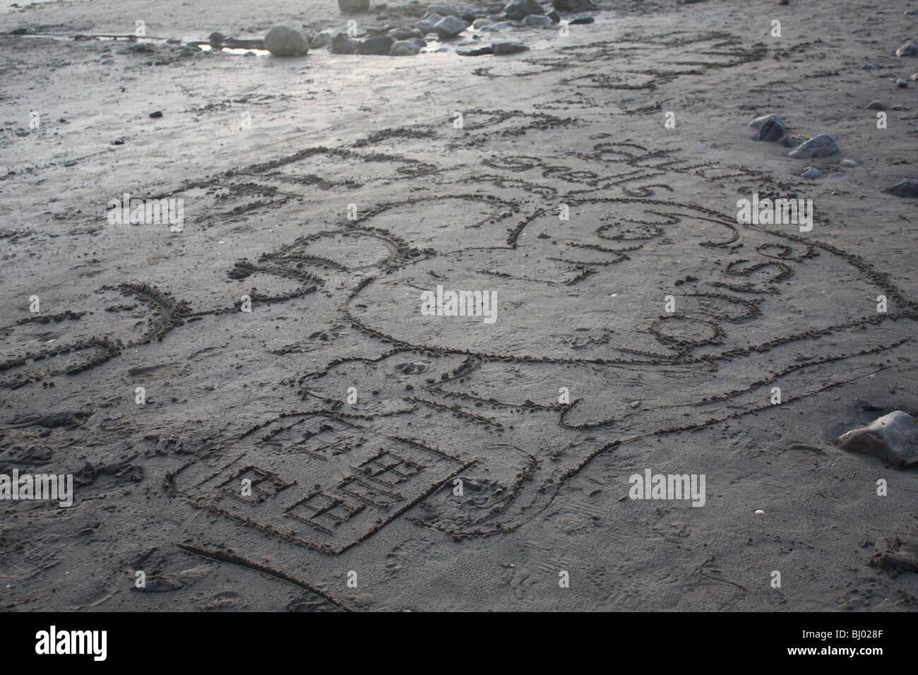 Writing in the sand hi-res stock photography and images - Alamy