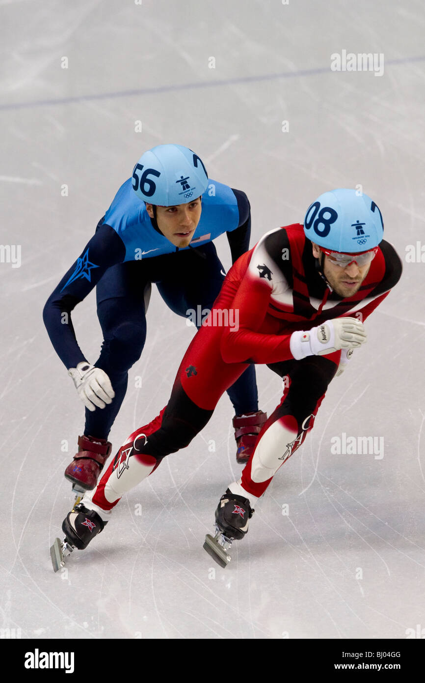 Francois-Louis Tremblay (CAN) and Apolo Anton Ohno (USA) competing in ...