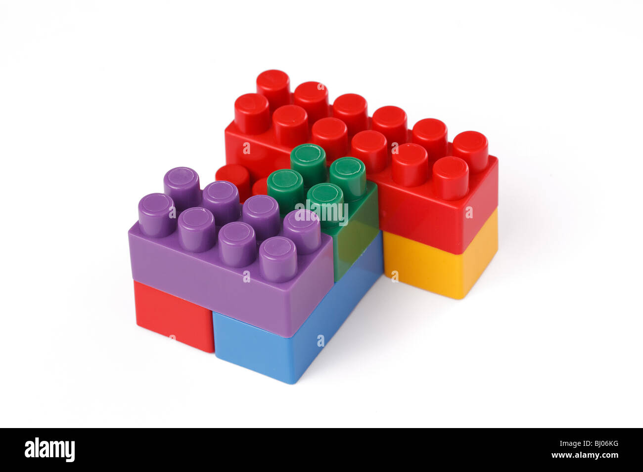 photo shot of plastic toy blocks on white background Stock Photo - Alamy