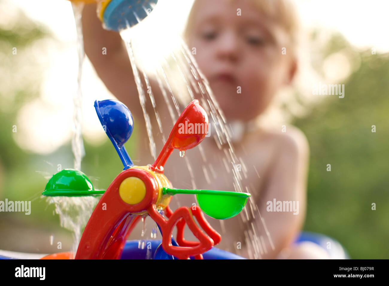 Kids Playing With Water High Resolution Stock Photography and Images ...