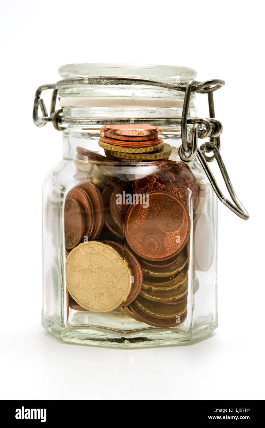 Coin jar saving Cut Out Stock Images & Pictures - Alamy