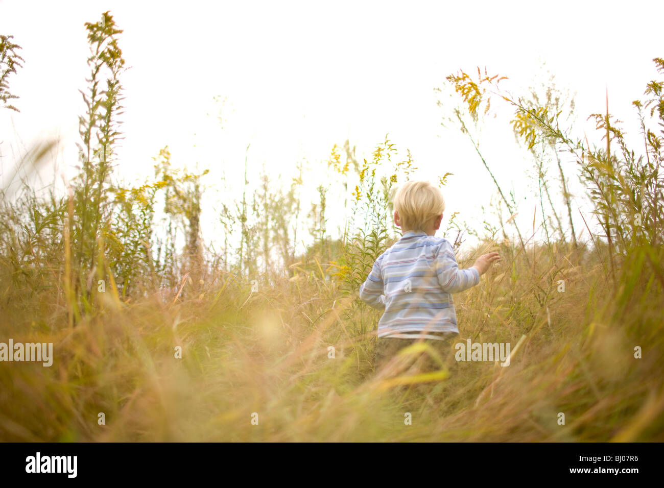 Children playing field running hi-res stock photography and images - Alamy