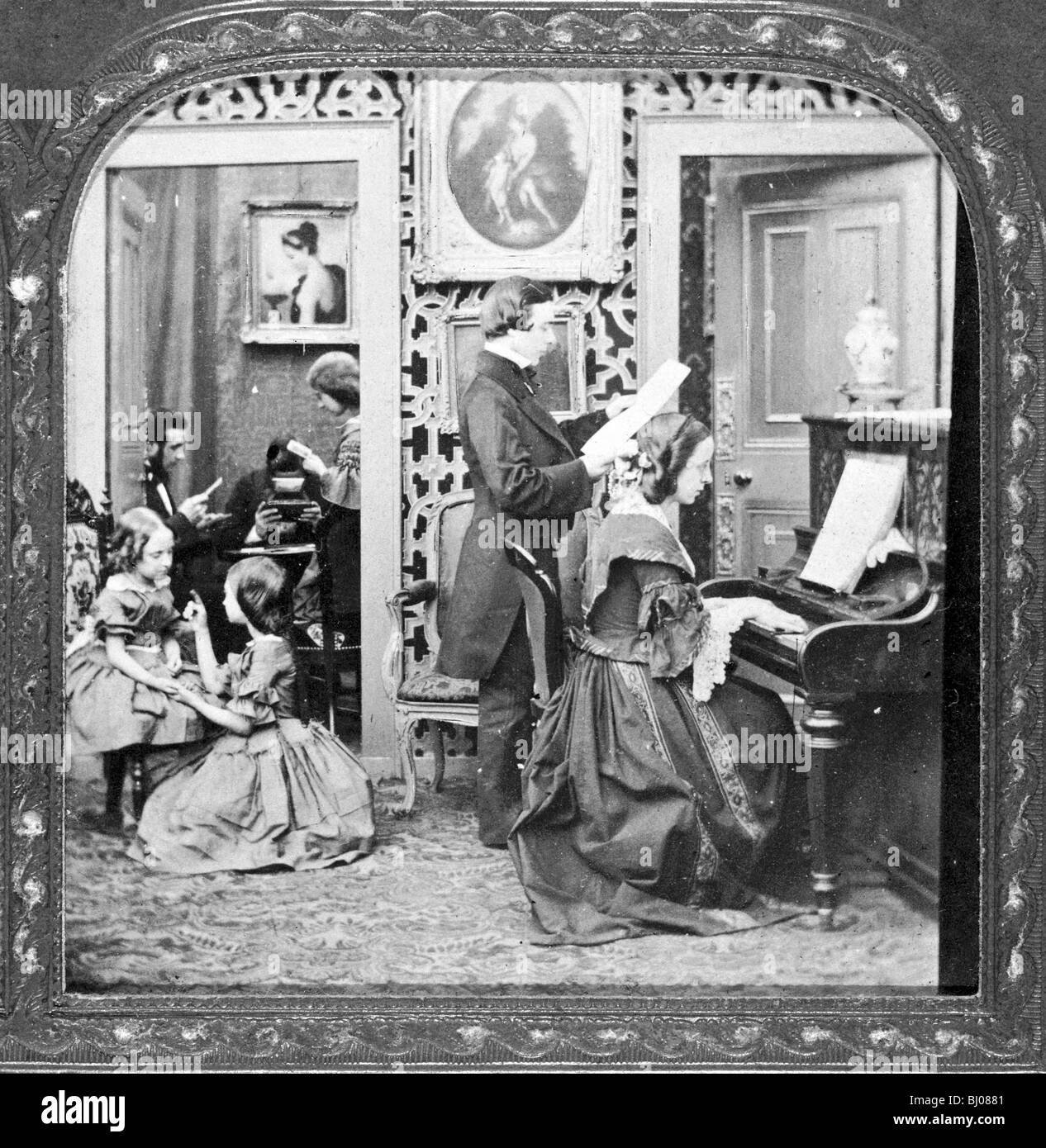 Victorian father children playing Black and White Stock Photos & Images ...