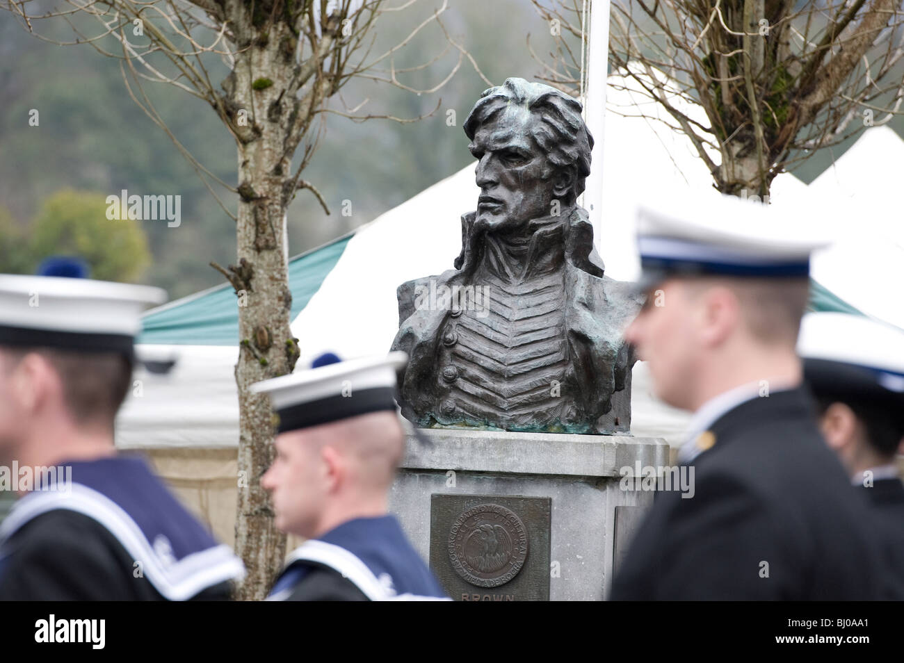 Members of the Irish Naval force pass a statue of Admiral William Brown ...