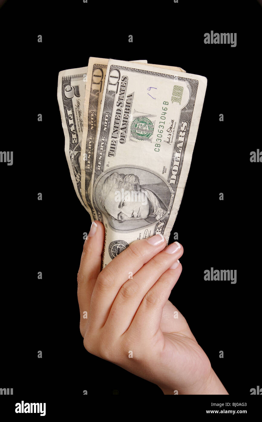 A hand holding money Stock Photo - Alamy