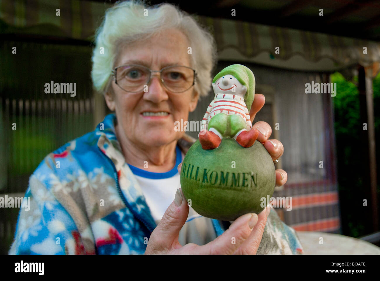 Old German lady show Welcome sign in Black Forest Germany Stock Photo ...