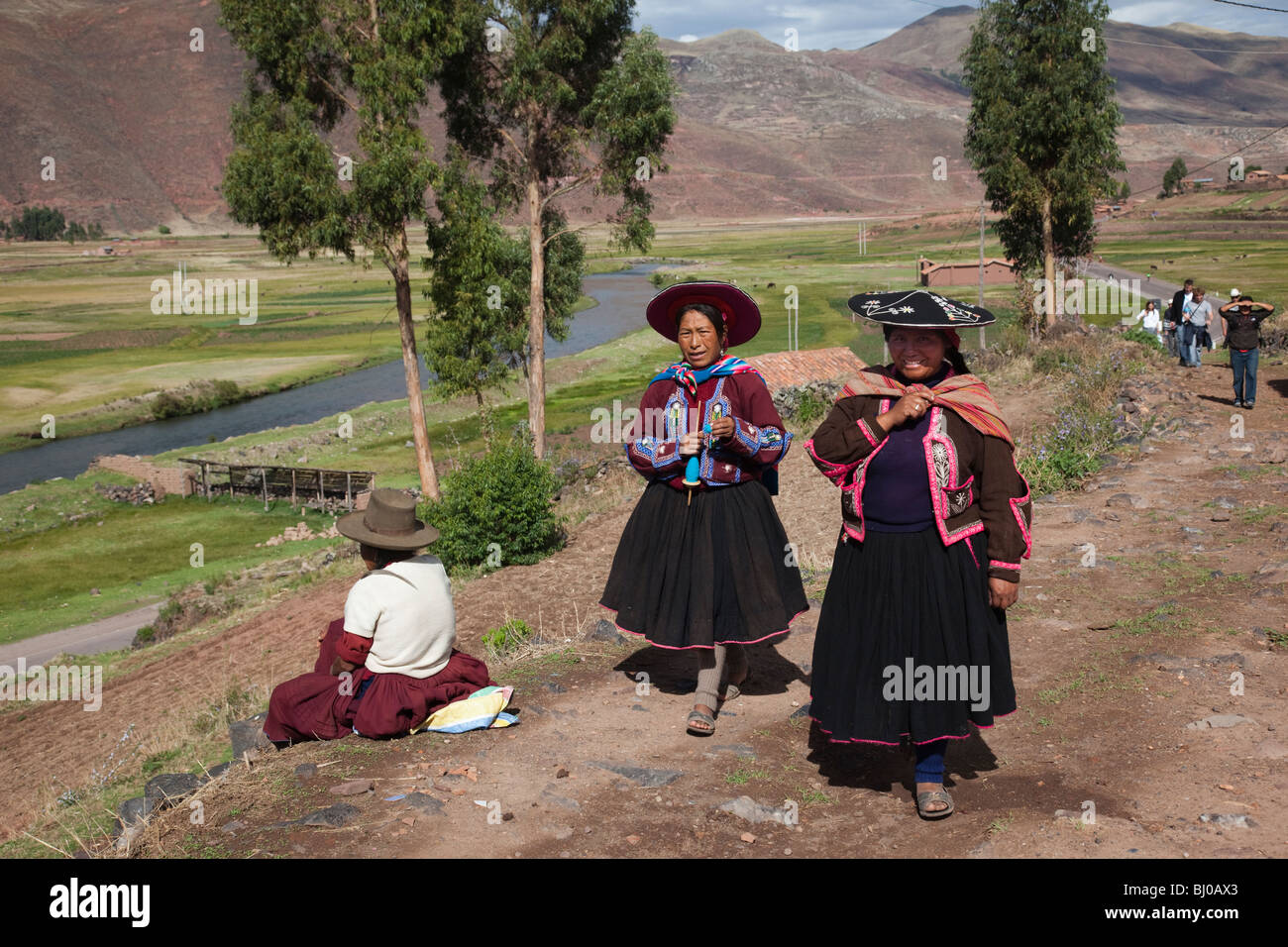 Several Peruvian woman in the countryside/village of Raqchi on the ...