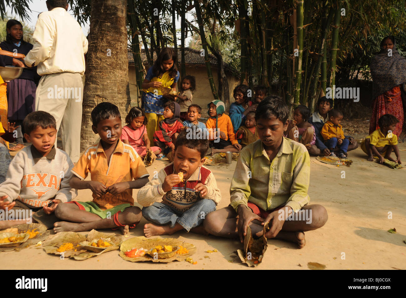 Indian family eating a feast hi-res stock photography and images - Alamy