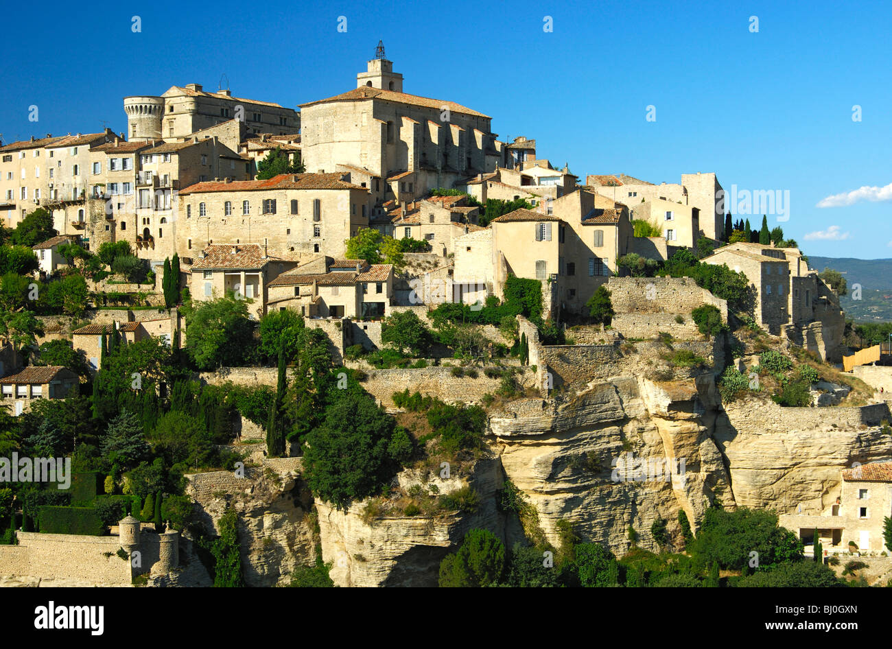 Gordes with the Château de Gordes and the Saint-Firmin church on the ...