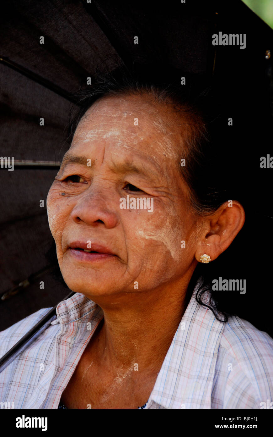 Lady under umbrella hi-res stock photography and images - Alamy