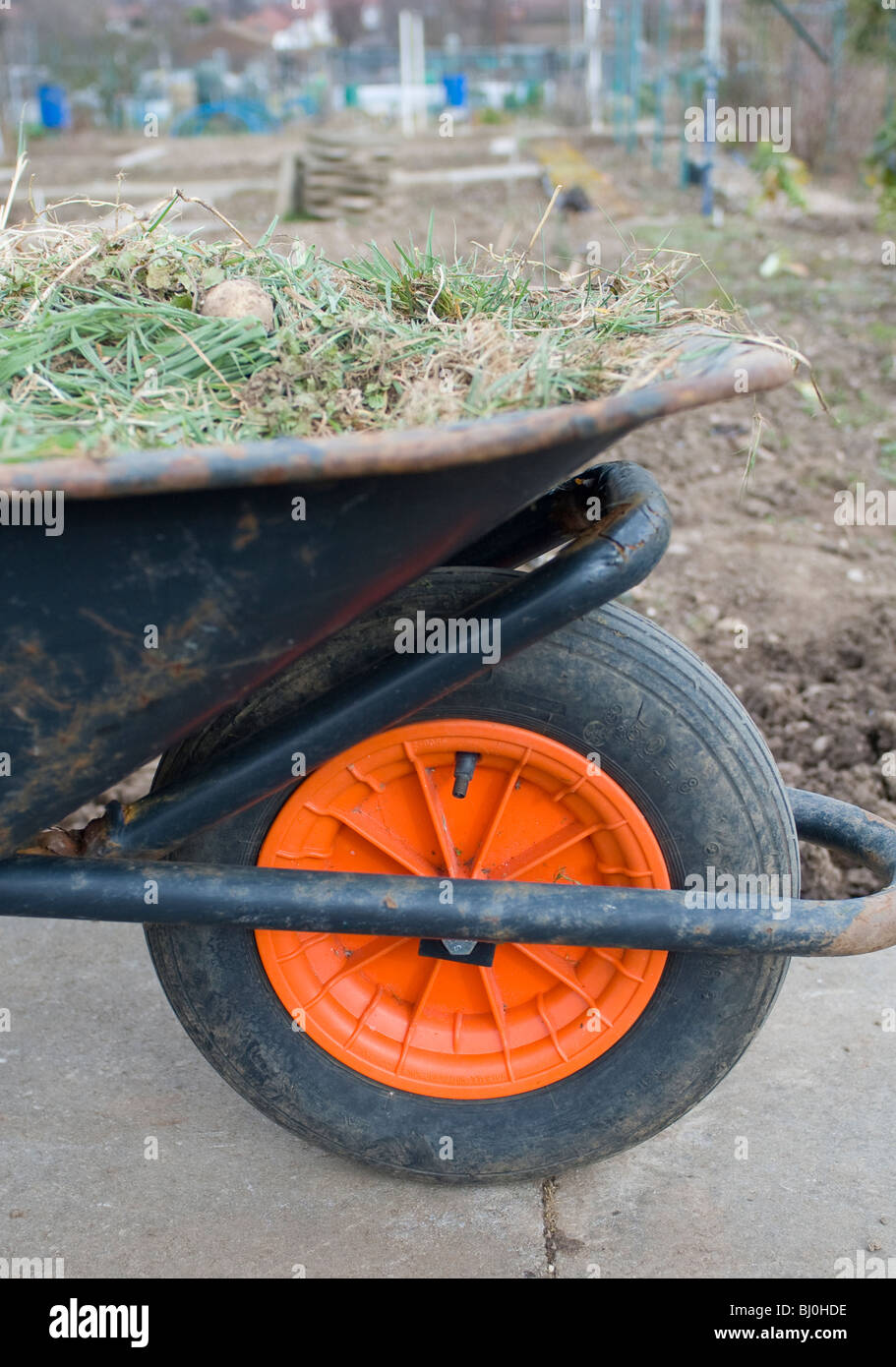wheelbarrow on path Stock Photo - Alamy