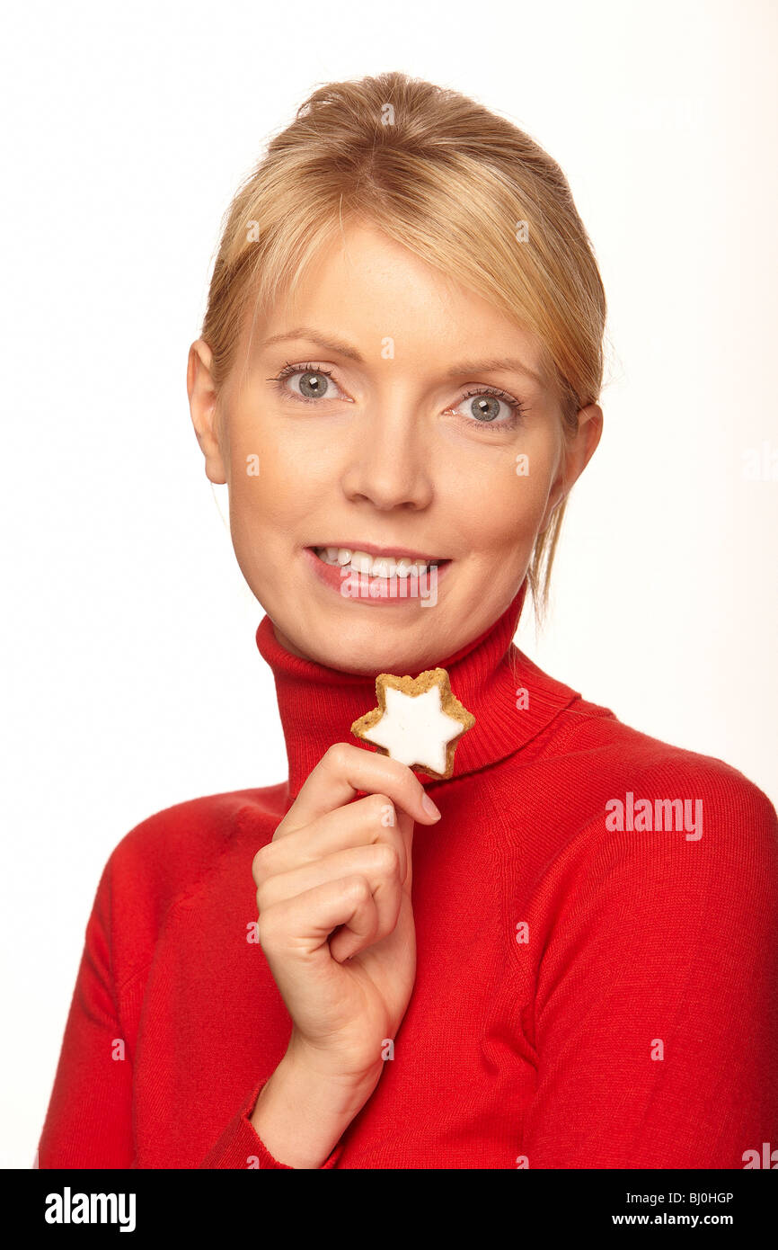Woman eating biscuit hi-res stock photography and images - Alamy
