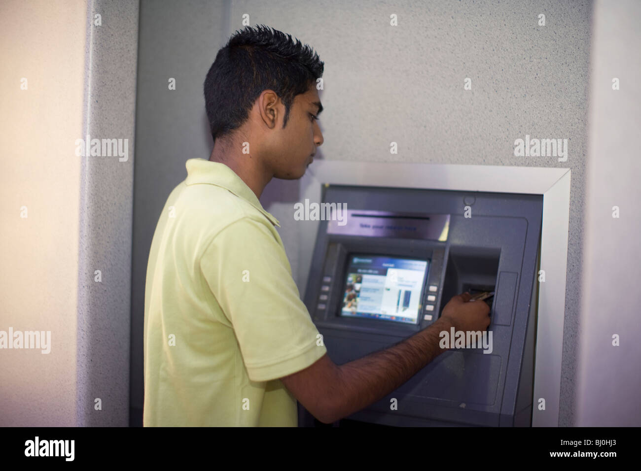 Man drawing money at ATM, KwaZulu Natal , South Africa Stock Photo - Alamy
