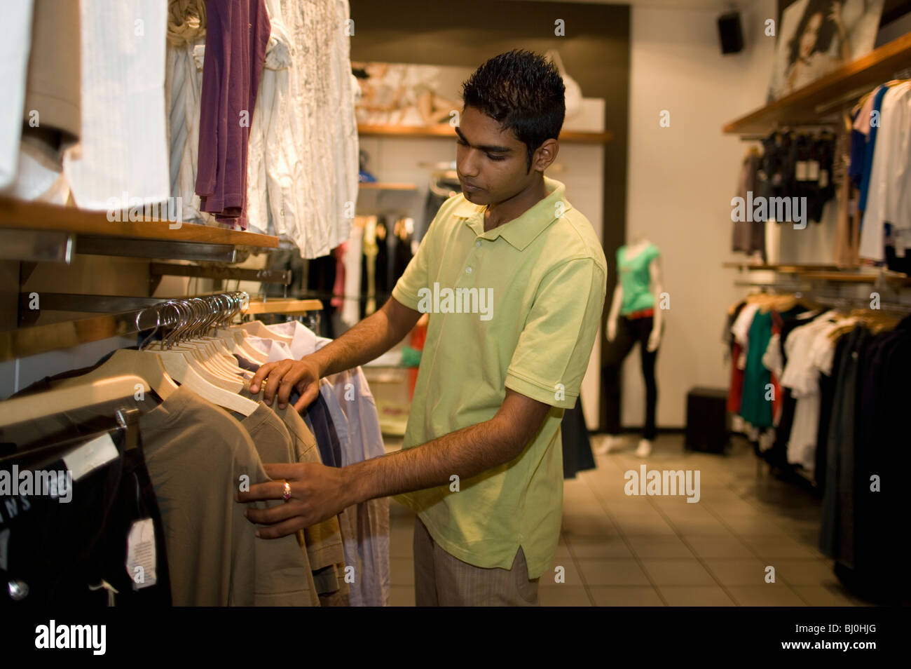 Man looking at clothes, KwaZulu Natal , South Africa Stock Photo - Alamy
