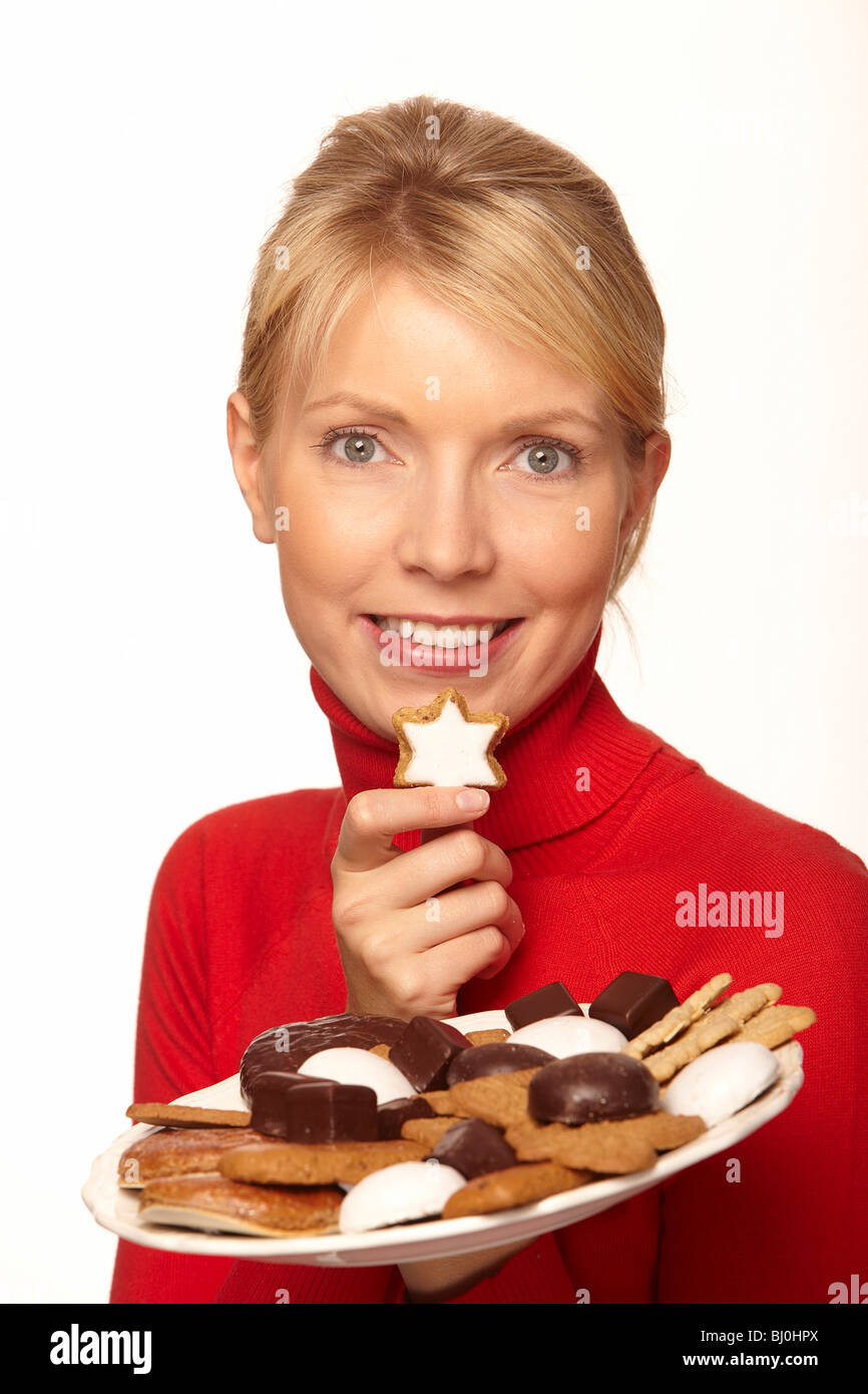 Woman Eating Ginger Biscuit High Resolution Stock Photography and ...