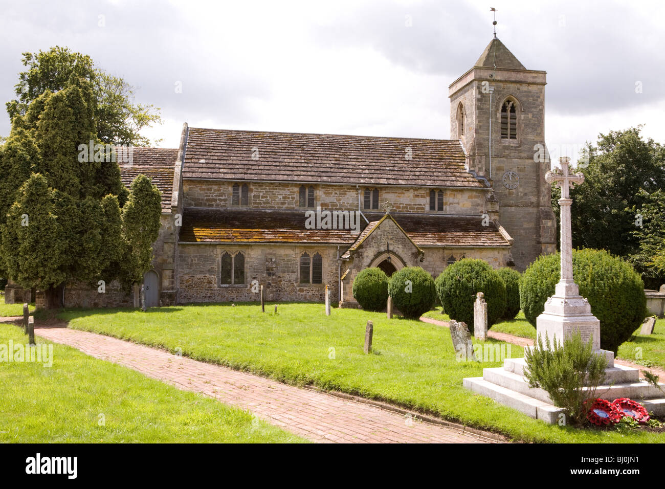 An old church with bushes and trees Stock Photo - Alamy