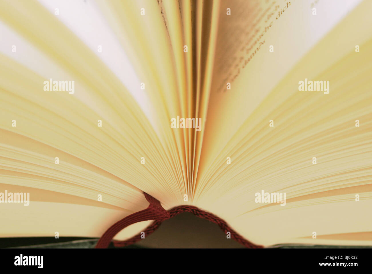 Opened up book Stock Photo - Alamy