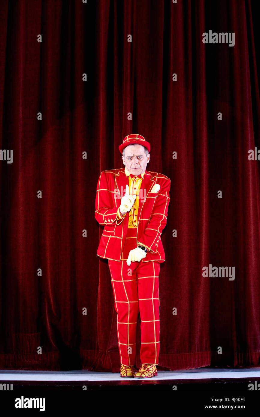 clown performing on stage Stock Photo - Alamy