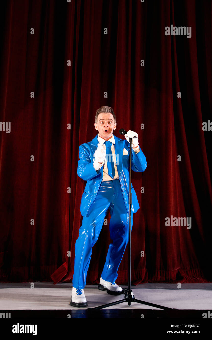 comedian performing on stage Stock Photo - Alamy