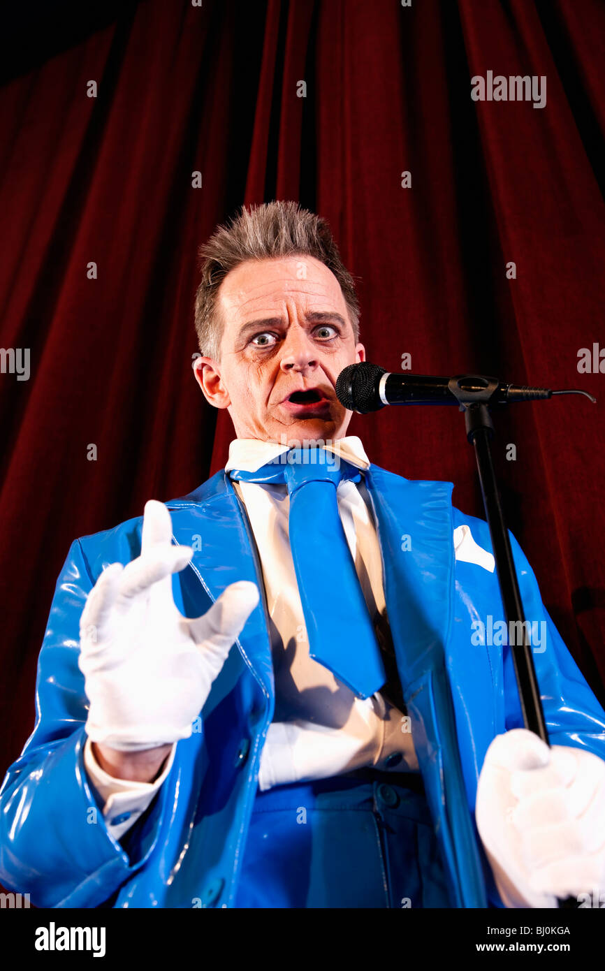 comedian performing on stage Stock Photo - Alamy