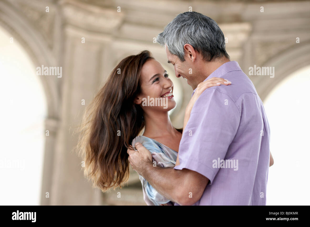 portrait of couple embracing Stock Photo - Alamy