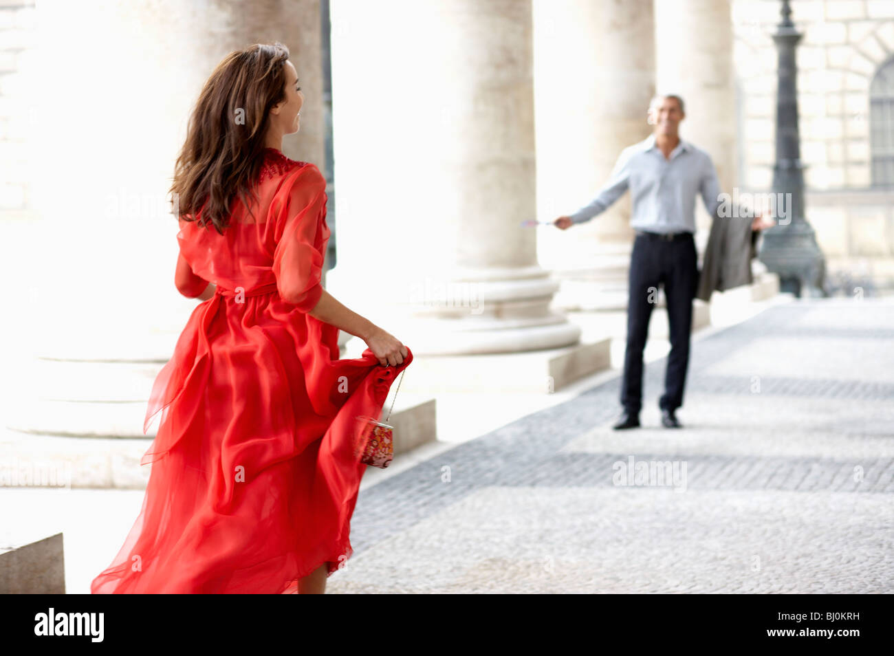 Female running towards you dress hi-res stock photography and images ...