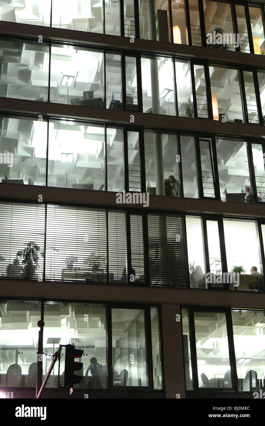 Employees in an office building in the evening, Berlin, Germany Stock ...