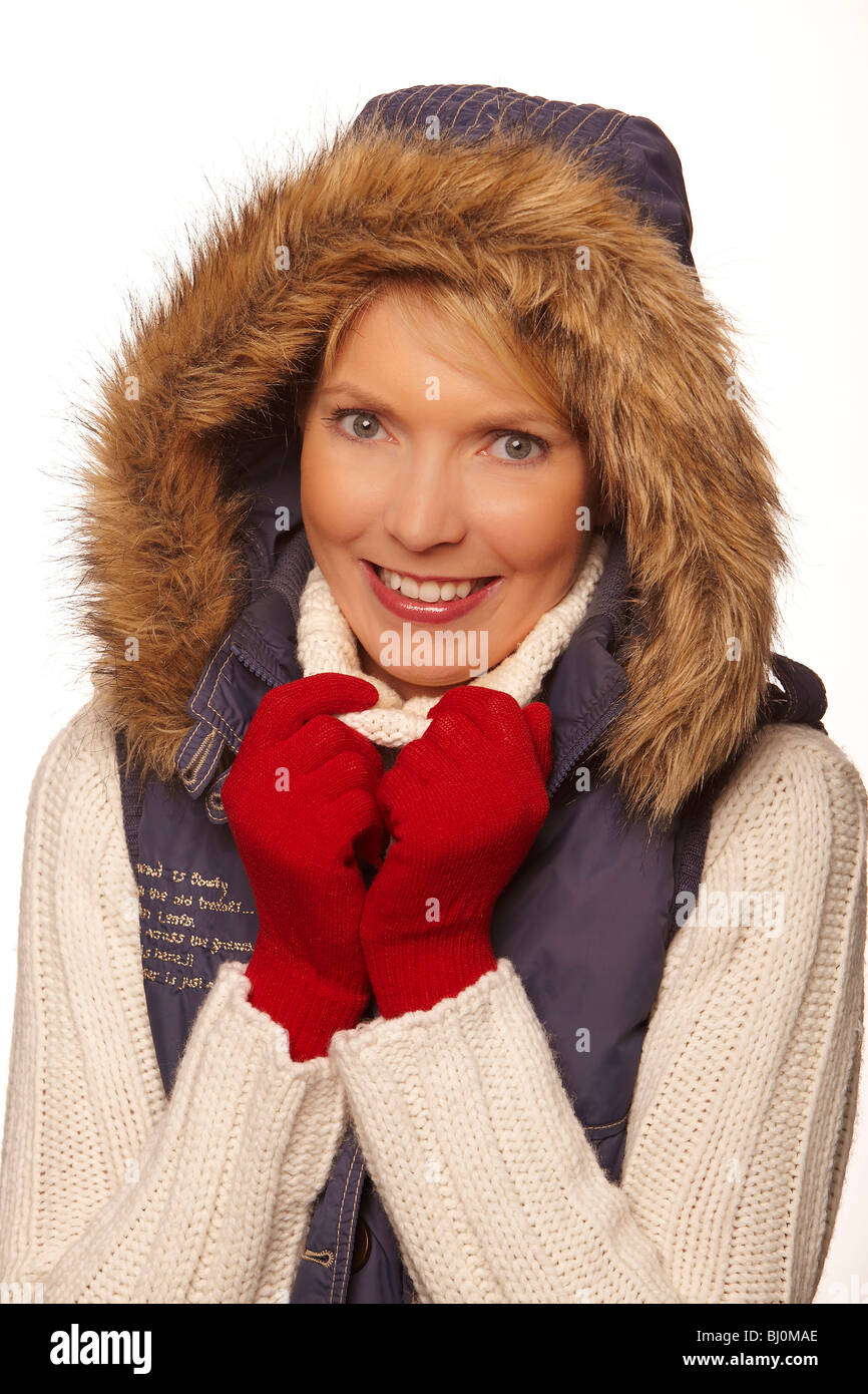 Portrait of a freezing woman with red gloves Stock Photo - Alamy