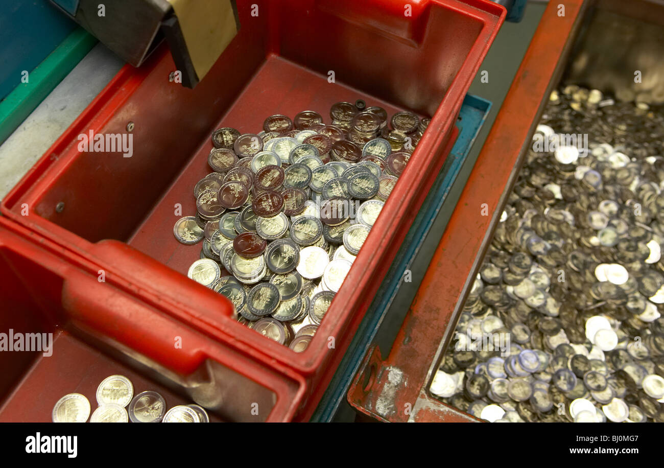 Boxes with newly minted 2 Euro coins in the State Mint Berlin, Germany ...