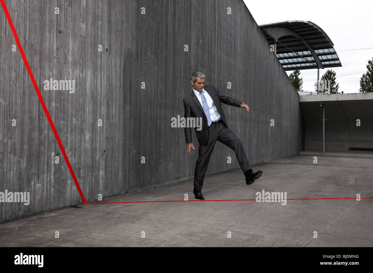 businessman crossing red line Stock Photo - Alamy businessman crossing red line Stock Photo - Alamy