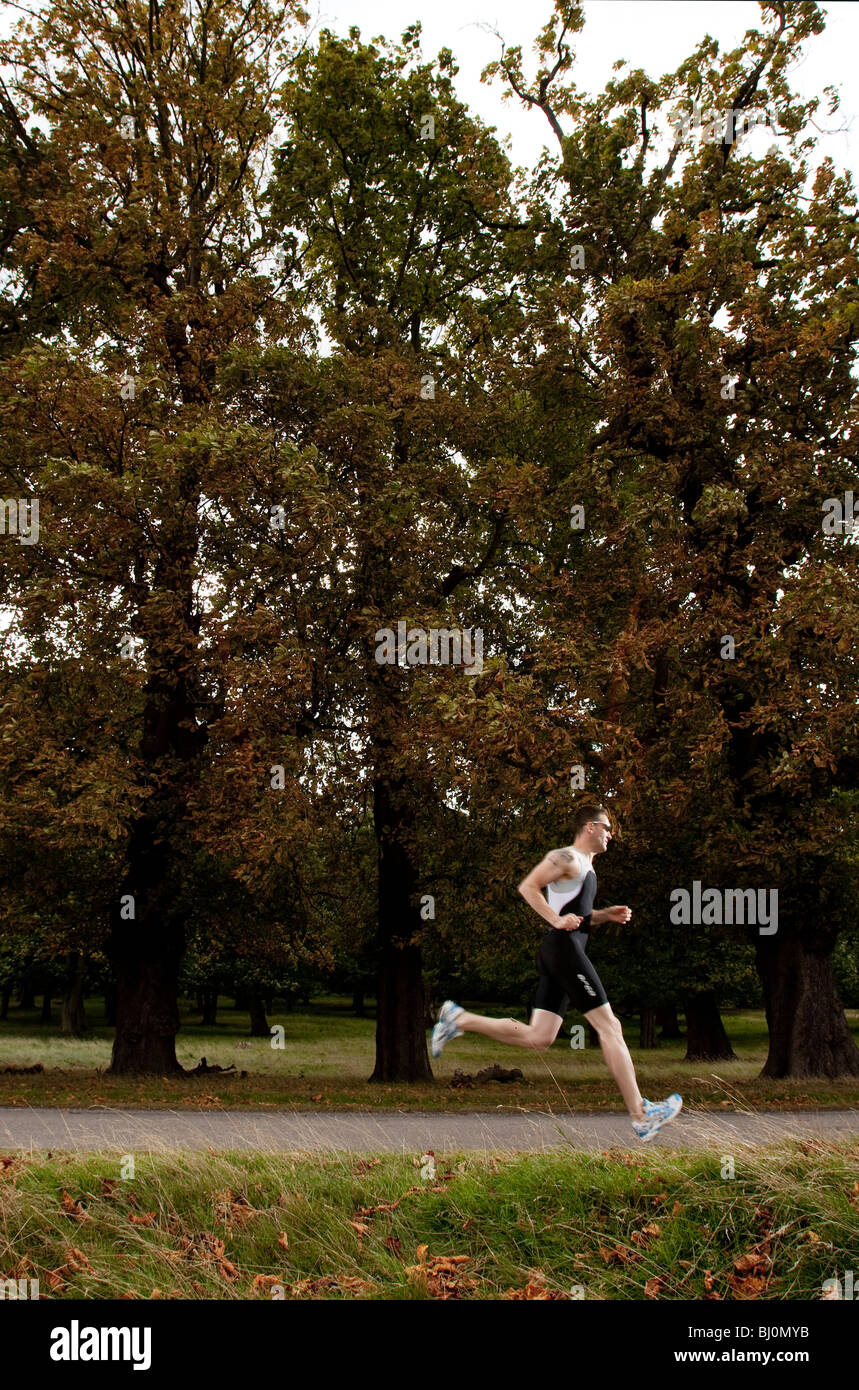 man running on road Stock Photo - Alamy