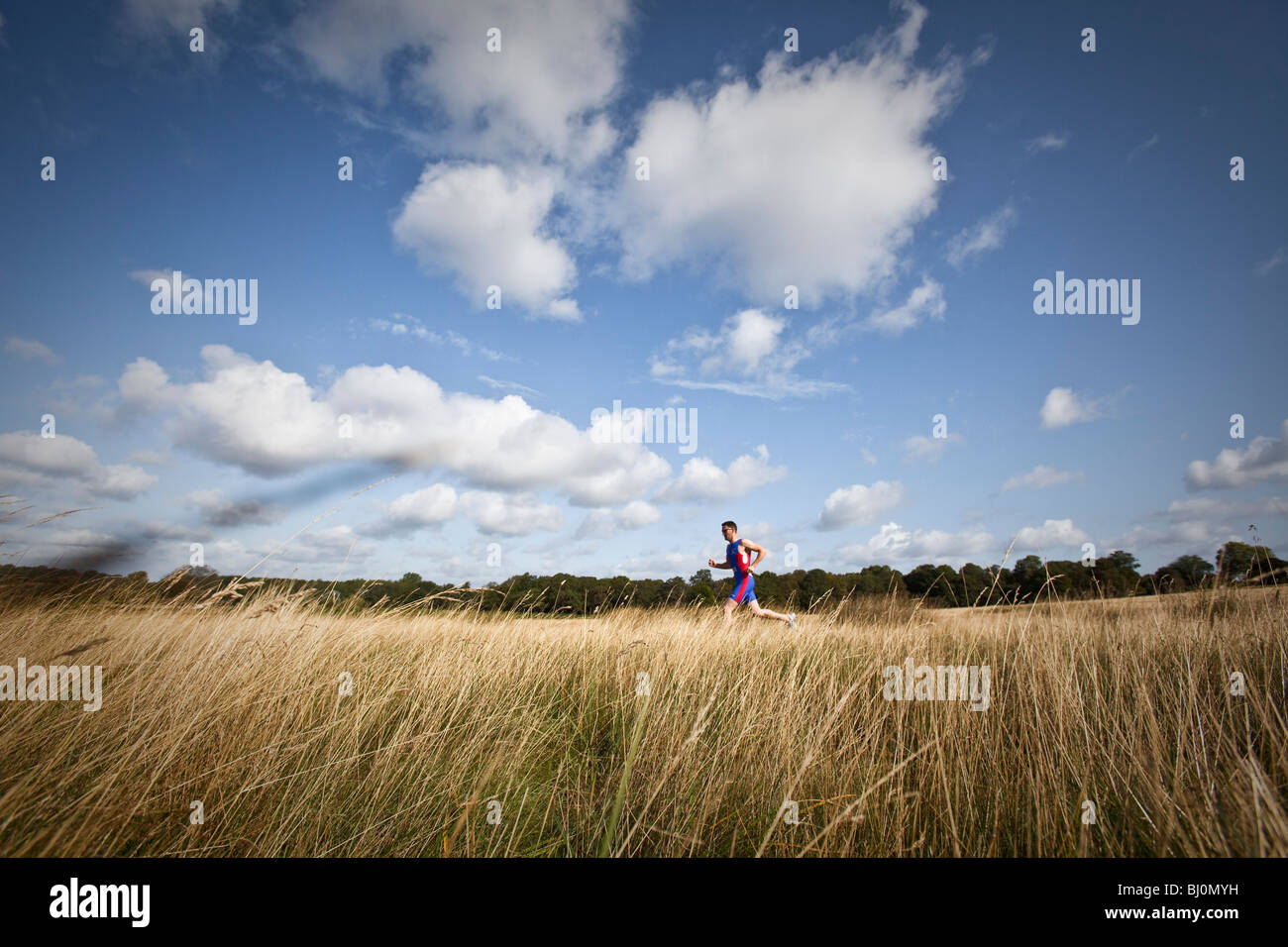 man running on road Stock Photo - Alamy