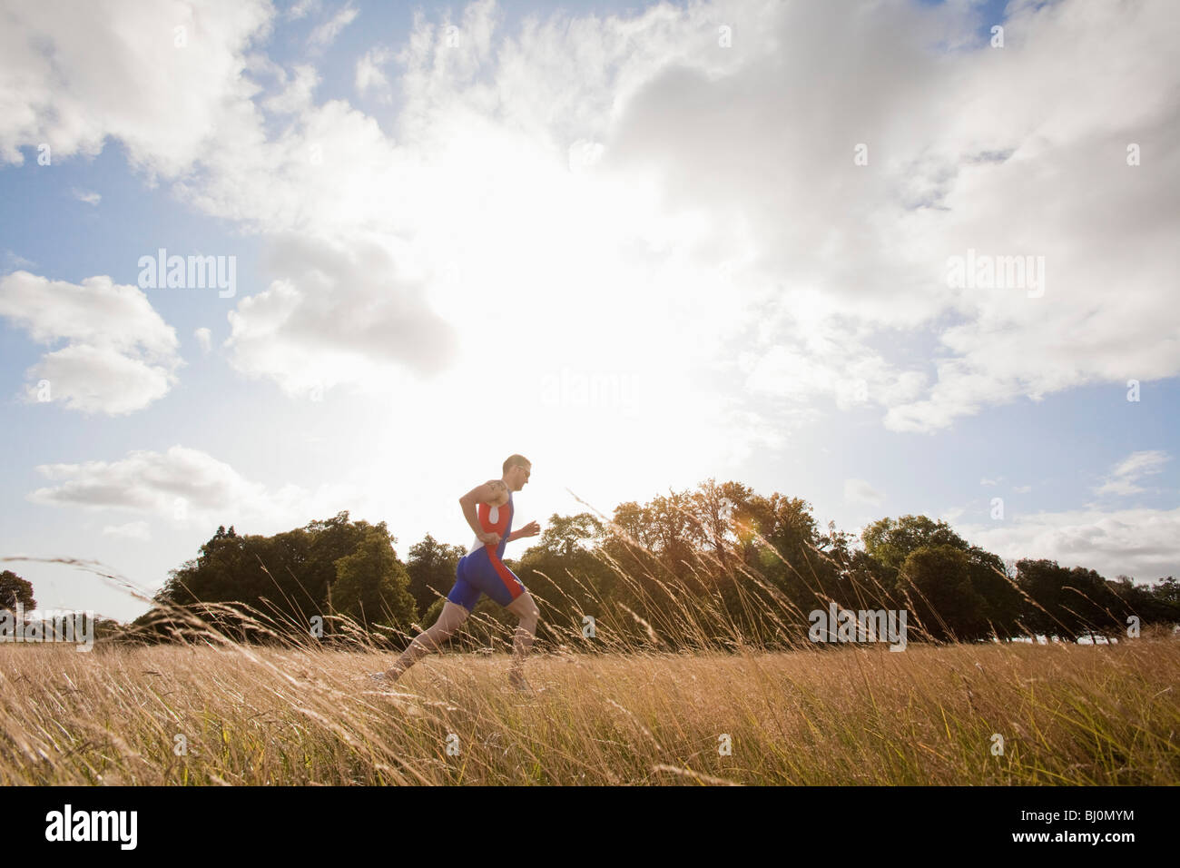 man running on road Stock Photo - Alamy