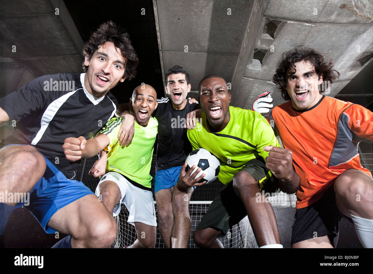 football players cheering Stock Photo - Alamy