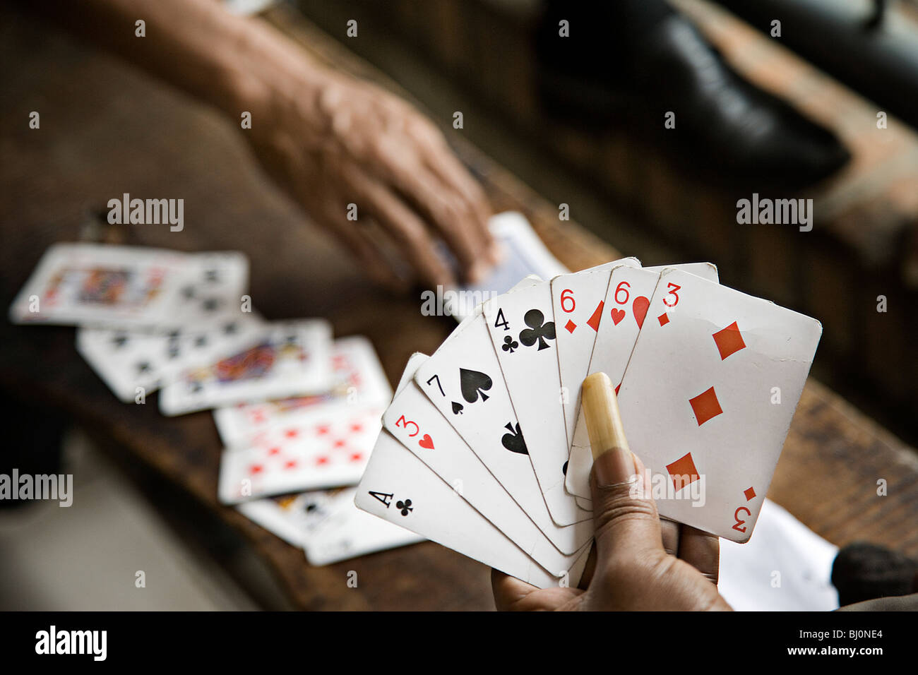 Card players outside hi-res stock photography and images - Alamy