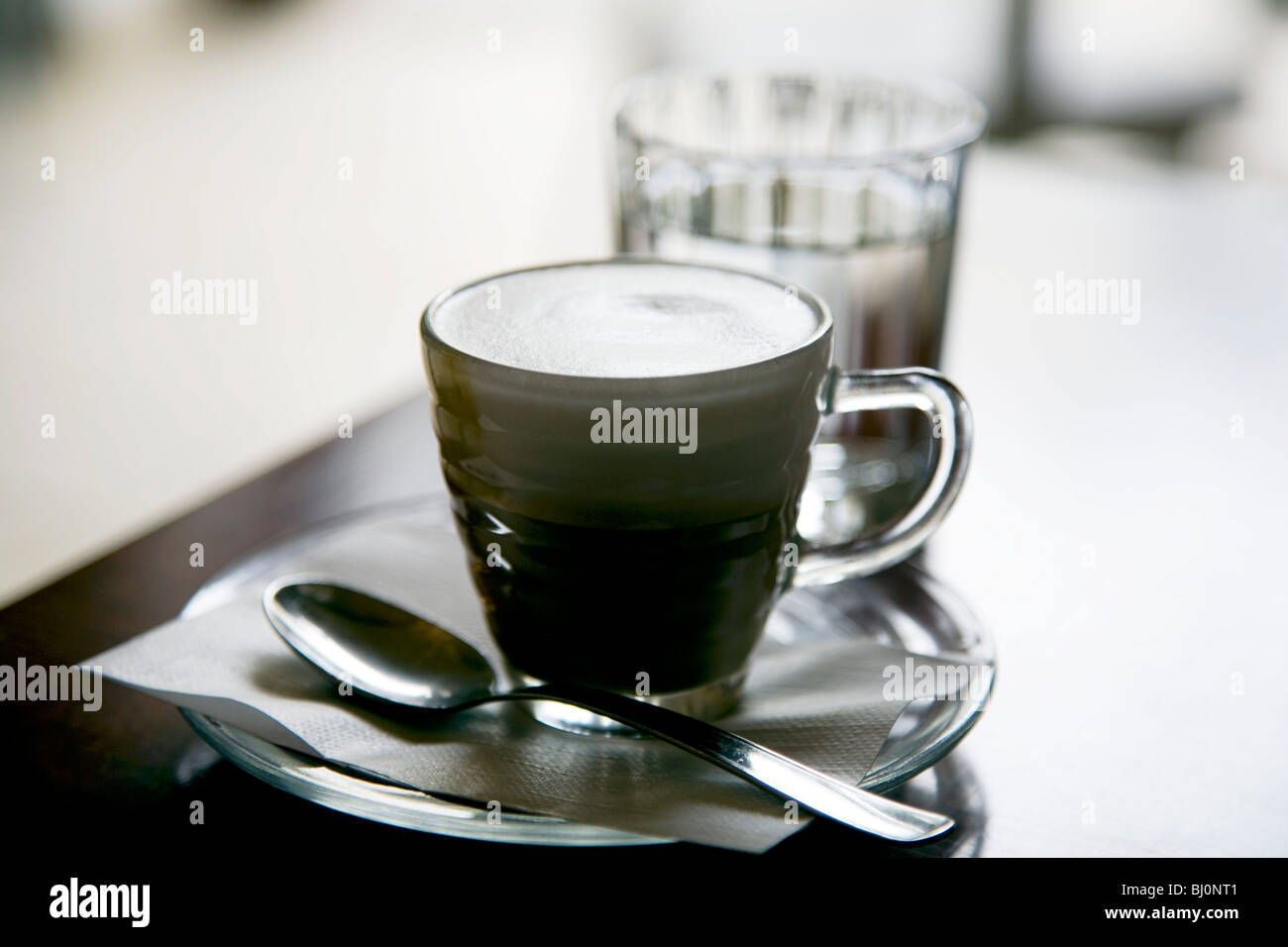 still life of coffee cup and glass of water Stock Photo - Alamy