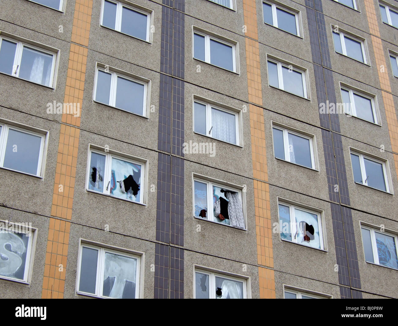 Broken windows in a block of flats, Berlin, Germany Stock Photo - Alamy