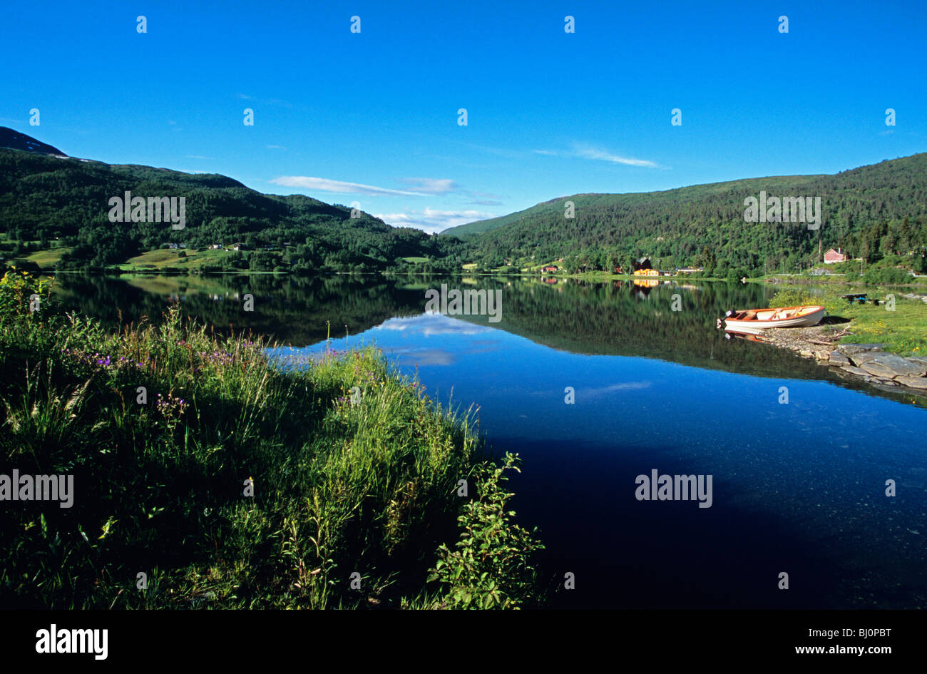 Beautiful reflections on Oppheim Lake near Vossestrand Stock Photo - Alamy
