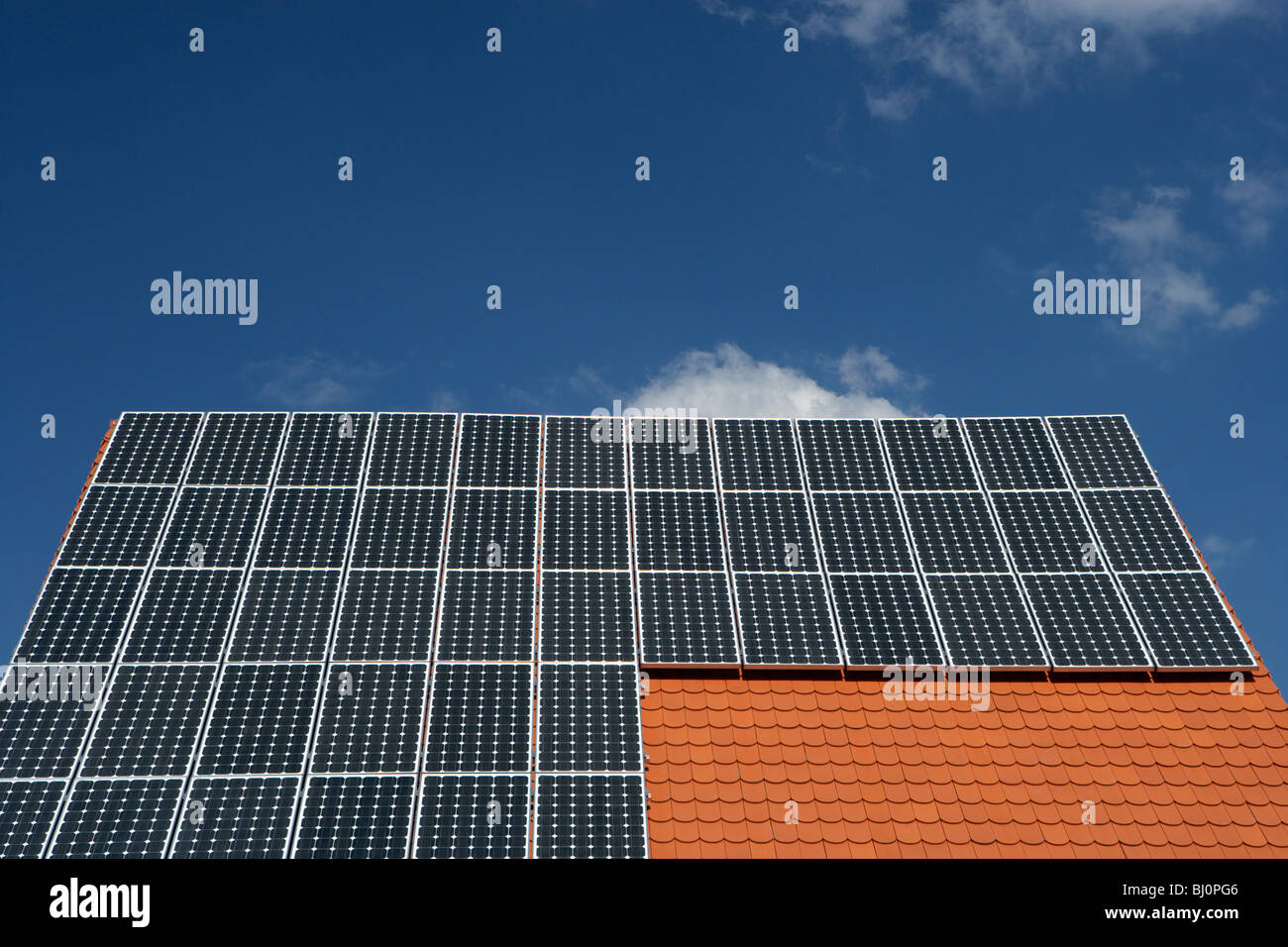 Solar cells on a roof Stock Photo - Alamy