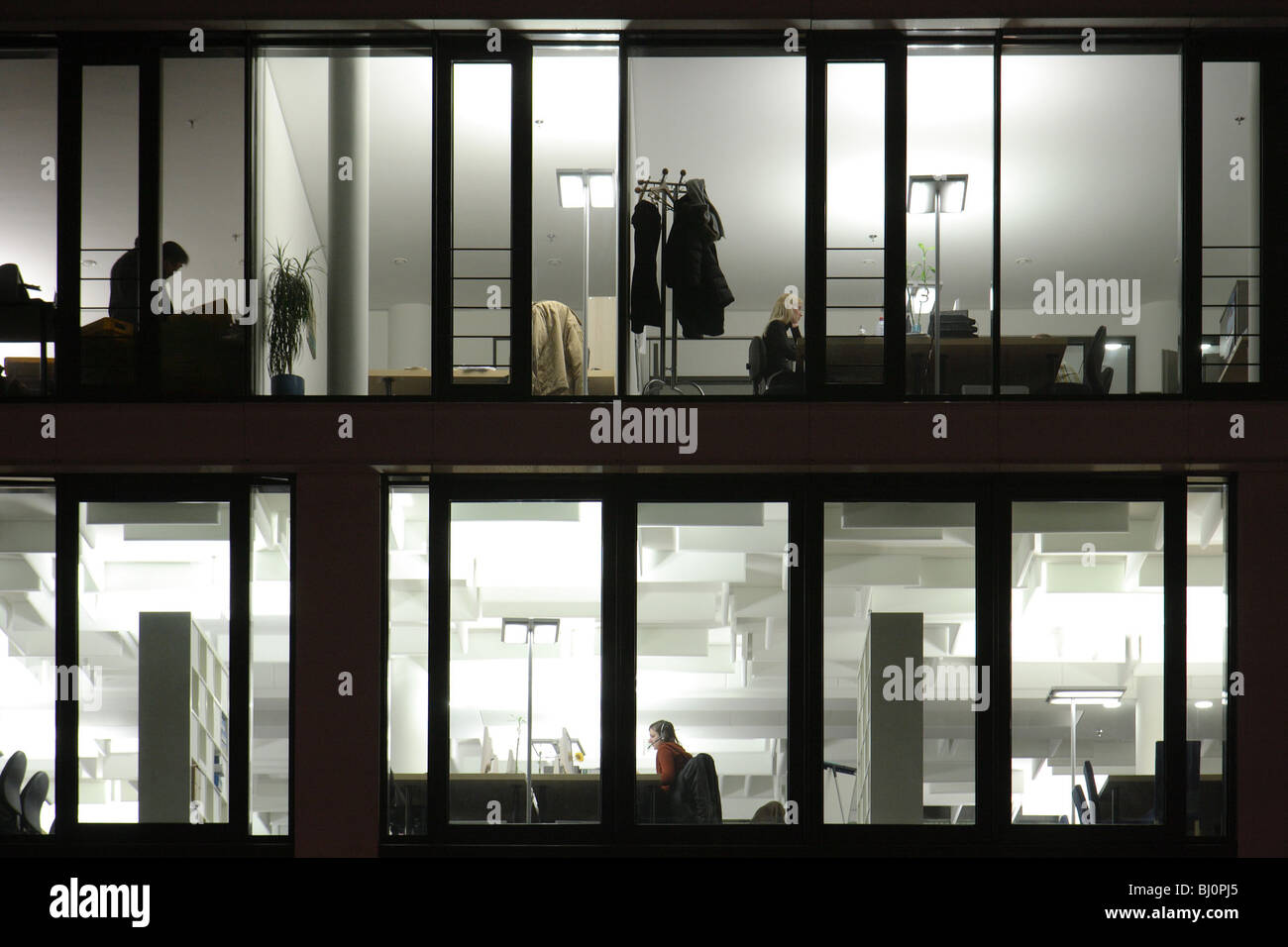 Employees in an office building in the evening, Berlin, Germany Stock ...
