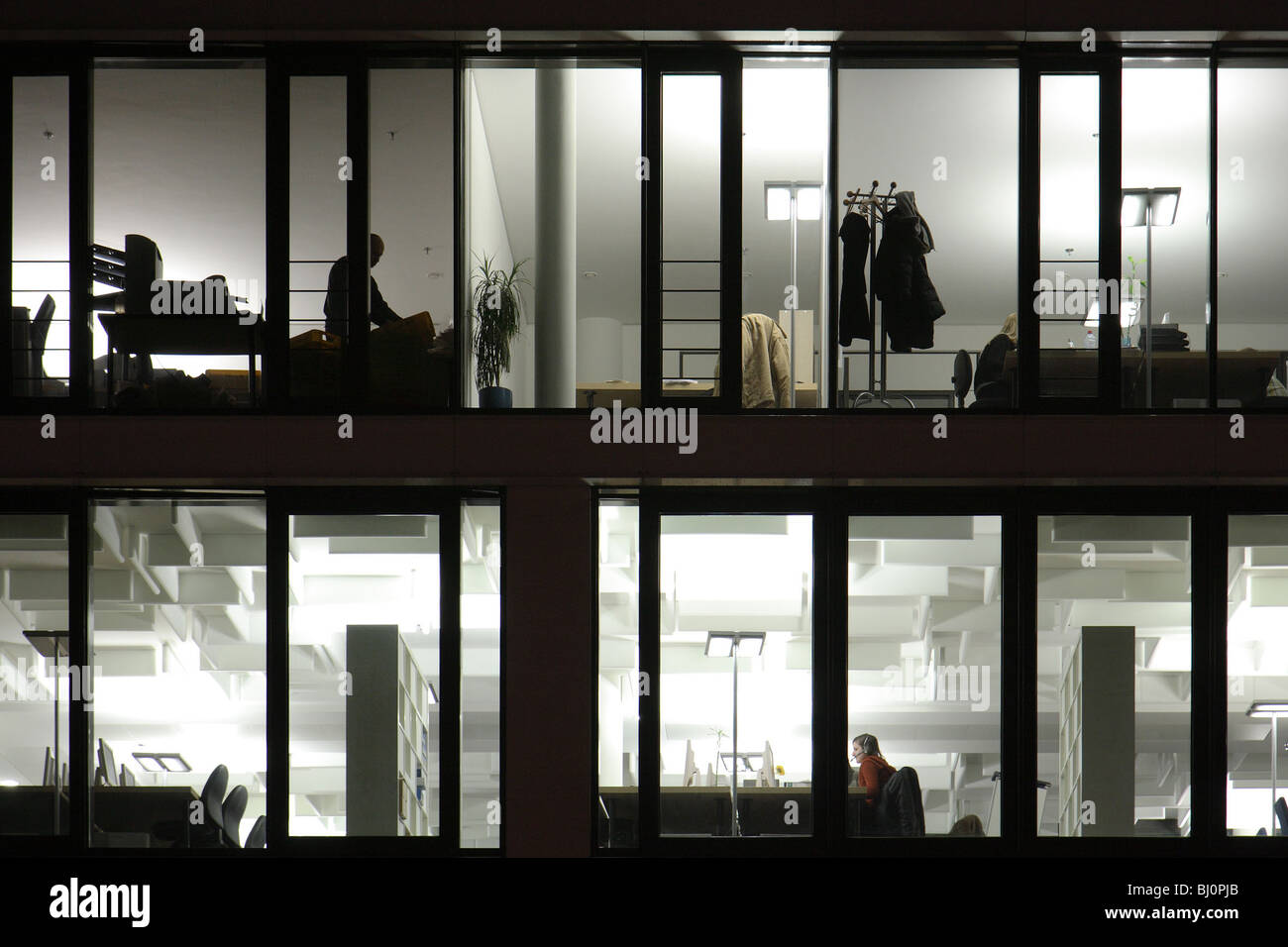 Employees in an office building in the evening, Berlin, Germany Stock ...