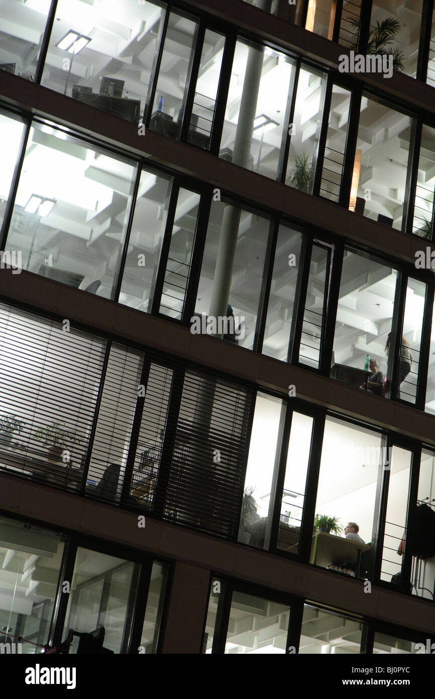 Employees in an office building in the evening, Berlin, Germany Stock ...