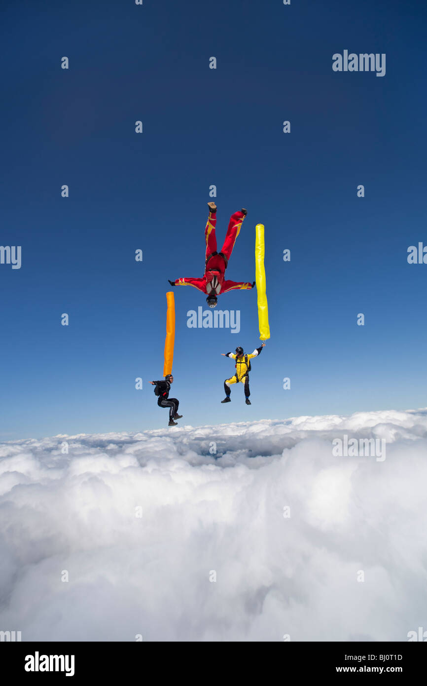 Skydivers with colourful tubes flying around each. The Freeflyers are ...