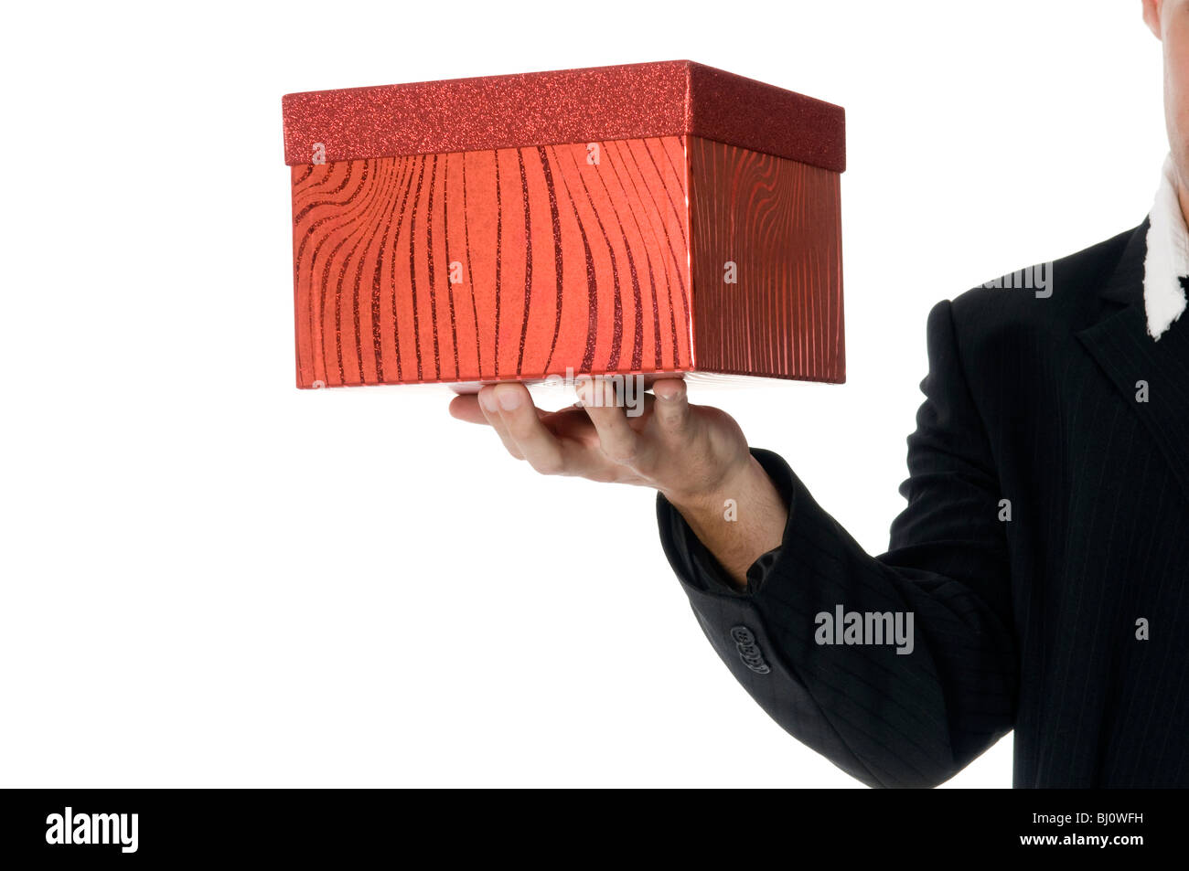 Human hand holding present Stock Photo - Alamy